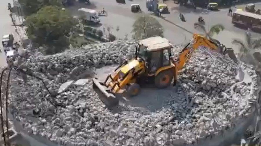 'JCB Upar Kaise Pahuncha?': Ahmedabad Residents Stunned As Excavator ...